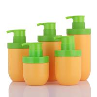 China Wholesale greem and orange unique airless 50ml cosmetics empty  face lotion bottle for sale