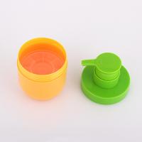 China Wholesale greem and orange unique airless 50ml cosmetics empty  face lotion bottle for sale