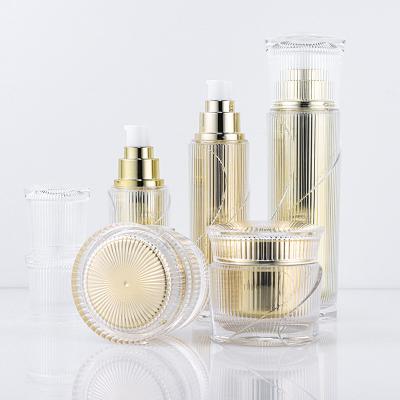 China 50g Cosmetic Packaging Sets Gold Empty Acrylic Pump Bottle Cosmetic Jar Suit for sale