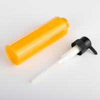 China Customized PET Round Lotion Pump Shampoo Bottle Cylinder Yellow color for sale