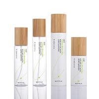 China Eco Friendly PET Plastic Cosmetic Packaging Shampoo Bottles with Bamboo Pump lid for sale