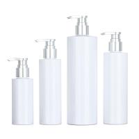 China PET White Round Shower Gel 200ml 500ml Silver Top Serum Conditioner Plastic Shampoo Pump Skincare Packaging Bottle for sale