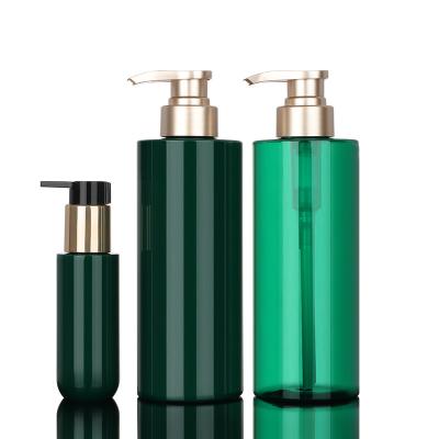 China Luxury 16oz Green Round Kylie Skin Clear Body Hibiki Empty 500ml Shampoo And Conditioner Bottles With Gold Pump for sale