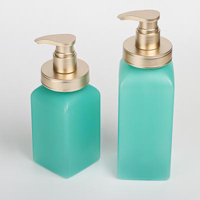 China Luxury 500ml 750ml Matte Light Green Square Body Wash Soap Airless Salon Packaging Shampoo Bottle With Gold Pump for sale