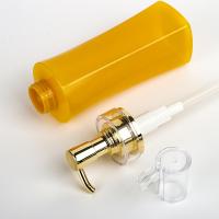 China 350ml 500ml Luxury Yellow Color Empty Lotion Body Airless Kylie Skin Care Shower Gel Bottles With Gold Pump for sale