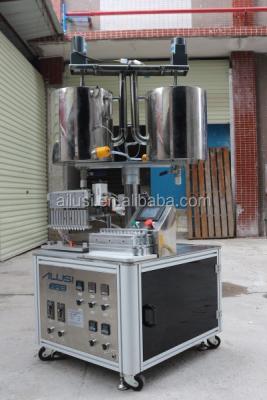 China 12 Nozzle Automatic Lipstick Filling Machine 20L Double Jacketed Hopper 220V Cosmetic Packaging for sale
