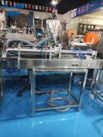 China Semi Automatic Horizontal Pneumatic Liquid Filler 0.4-0.6MP Air Pressure 100-1000ml for sale