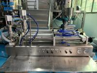 China Semi Automatic Double Heads Paste Piston Filler Water Bottle Pneumatic Filling Machine for sale