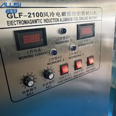 China Automatic Continuous Electromagnetic Induction Aluminum Foil Sealing Machine 220V 6000W for sale