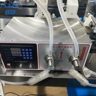 China Double Head Magnetic Pump Liquid Filling Machine Liquor Beverage Edible Oil for sale
