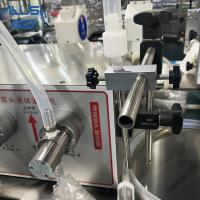 China Double Head Magnetic Pump Liquid Filling Machine Liquor Beverage Edible Oil for sale