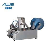 China PLC Semi Automatic Round Bottle Labeling Machine 100W 1200-2400 Bottles Per Hour for sale