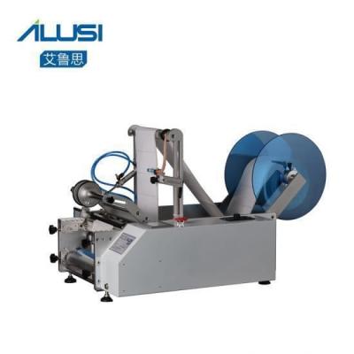 China PLC Semi Automatic Round Bottle Labeling Machine 100W 1200-2400 Bottles Per Hour for sale