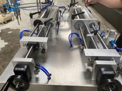 China 100-1000ml Double Head Horizontal Semi Automatic Liquid Filling Machine 316L Stainless Steel for sale