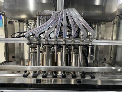 China Automatic 2-8 Nozzle Liquid Filling Machine 100-1000ml Stainless Steel Bottle Filler for sale