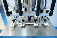 China 4 Nozzles Bottle Liquid Filling Machine SUS304 GMP Standard for sale