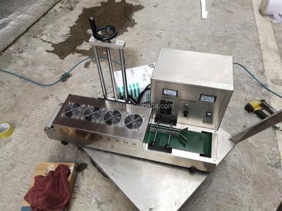China Automatic Electromagnetic Induction Aluminum Foil Sealing Machine 110V 220V 0-300C for sale