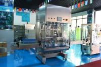China Automatic 2-8 Nozzle Liquid Filling Machine 100-1000ml Stainless Steel Bottle Filler for sale
