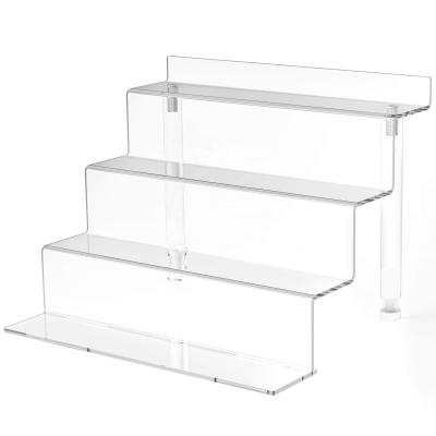 China zhenshun hot selling counter top 4 tiers clear acrylic riser display stand for sale