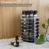 China Rotating Acrylic Display Stand Case Counter Top Clear Essential Oil Bottles Storage Rack For 64 Bottles for sale