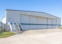 China Customized Long Span Metal Structure Hangar With Lounge And Office Area for sale