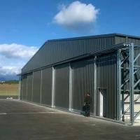 China Industrial Temporary Aircraft Repair Hangar Pre Engineered H Beam Steel Airplane Hangar for sale