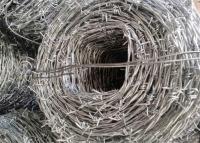 China 25kg Roll Silver Galvanized Razor Barbed Wire For Fence Home Security for sale