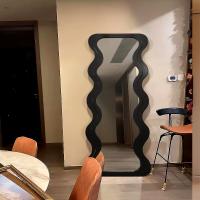 China OEM Floor Wavy Standing Mirror Black Ornate Wooden Frame for sale