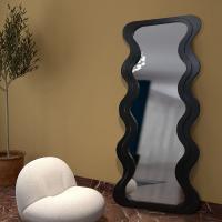 China OEM Floor Wavy Standing Mirror Black Ornate Wooden Frame for sale
