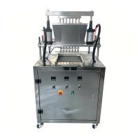 China Semi-Automatic Candy Depositing Machine with 304 Stainless Steel Piston Depositing for Small-Size Production for sale