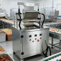 China Semi-Automatic Candy Depositing Machine with 304 Stainless Steel Piston Depositing for Small-Size Production for sale