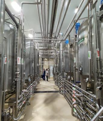 China 200-500 Kw Uht Milk Processing Plant PET Bottle Package Auto CIP Cleaning for sale