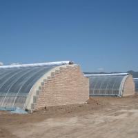 China Full Ventilated Film Covered Polyethylene Three Earth Wall Greenhouse for Winter Season for sale