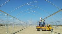 China Large Sawtooth Greenhouse Shine Tech Poly Tunnel Tropical Greenhouse With Ventilation for sale