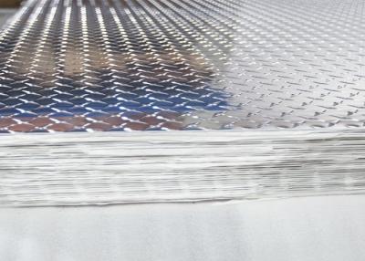China 3003 Aluminium Chequered Plate 4x8 0.6mm to 1.0mm Thickness with PVC Film for sale