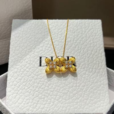 China 18K Gold Moissanite Cross Four Leaf Flower Pendant 18.2mm 0.34g Light Luxury Jewelry for sale