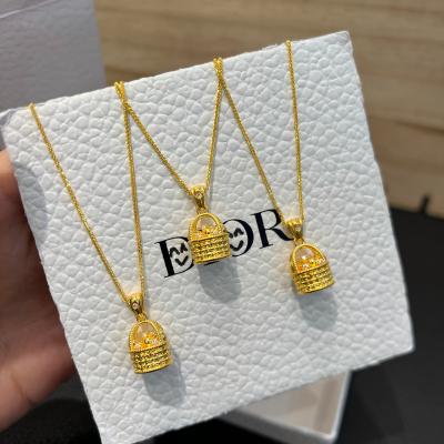 China 18K Gold Wealth Basket Pendant Moissanite 0.29g Auspicious Charm Jewelry for sale