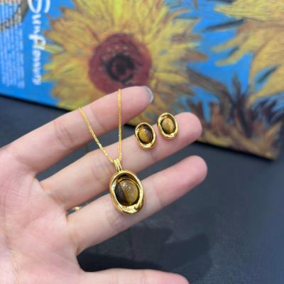 China 18K Gold Tiger Eye Stone Pendant Simple Minimalist Design 0.63g 13.4mm Daily Wear for sale
