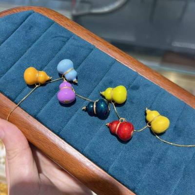 China 18K Gold Seven Gourd Pendant Moissanite Baked Paint 12.5mm 0.48g Bohemian Charm for sale