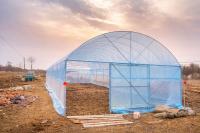 China Single‑Span Round‑Arch Polyethylene Agricultural Tunnel Greenhouse, Specially Designed for Solar Light Utilization & Heat Preservation, Suitable for Protected Cultivation. for sale