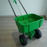 China OEM Fertilizer Spreader Cart Tow Behind Fertilizer Spreader Hand Held Seed Spreader for sale