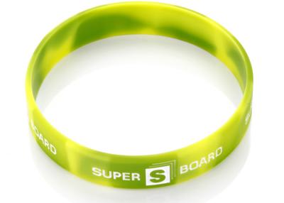 China Mult Color Swriled Debossed And Fill In Custom Silicone Rubber Wristbands for sale