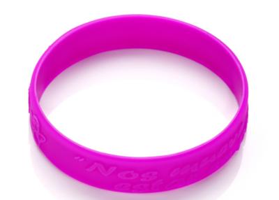 China Purple Solid Color Logo Embossed Party Custom Silicone Rubber Wristbands for sale