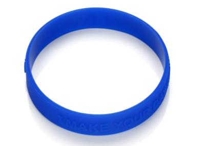 China Non Toxic Embossed Low Raised Promotional Blue Custom Silicone Rubber Wristbands for sale