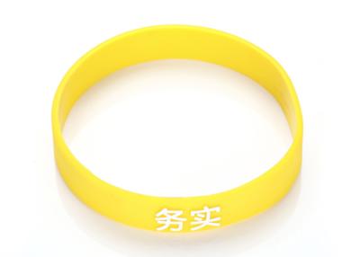 China Yellow Adult Promotional Emboss Printed Advertsing Custom Silicone Rubber Wristbands for sale