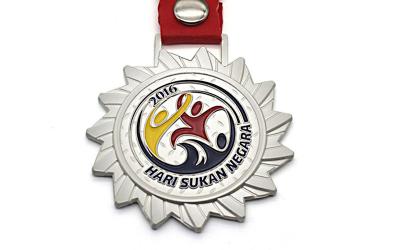 China Customized Color Sports Medals And Ribbons Embossed Logo Design 30g Weight for sale