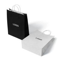 China Custom Kraft Paper Bags with Flat Handle Offset Printing for Food 300gsm for sale