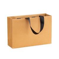 China Custom Logo Kraft Paper Gift Bag with Handles Stand Up Pouch for Jewelry Garment Packaging for sale