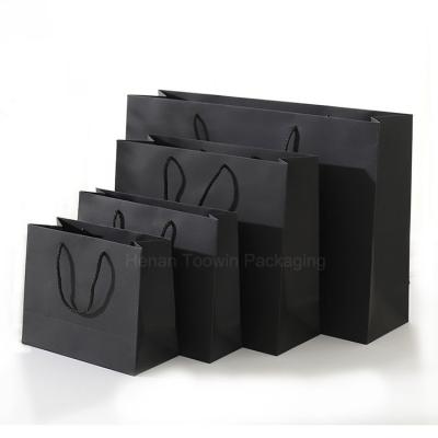 China Custom Black Matte Art Paper Shopping Bag with Luxury Design for Retail Stores for sale