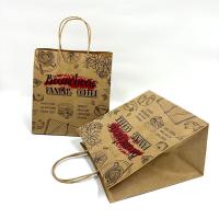 China Custom Kraft Paper Gift Bags with Logo for Retail Shopping 300gsm Durable for sale
